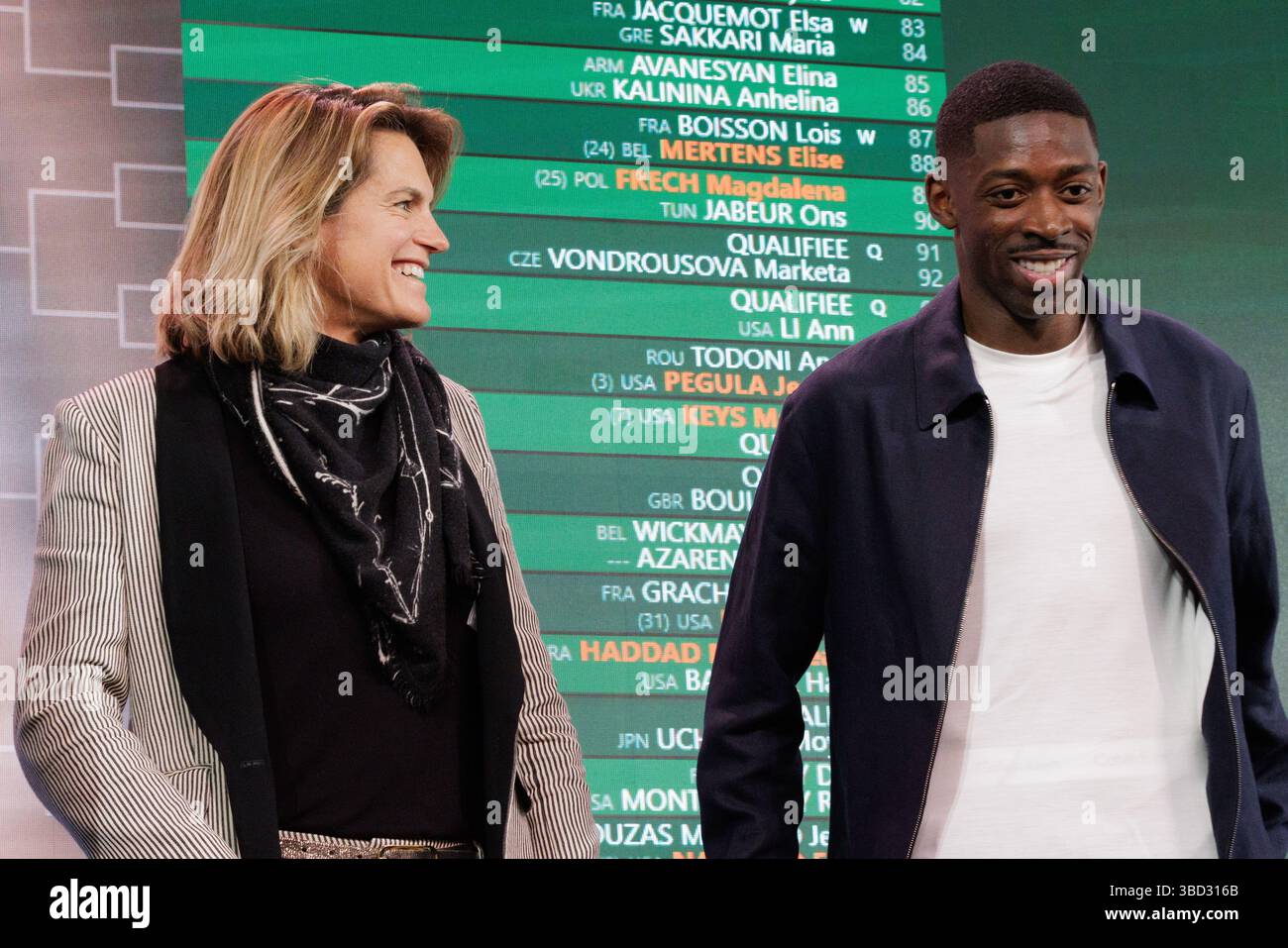 Amelie Mauresmo and Gilles Moretton during the qualifying of the Roland ...