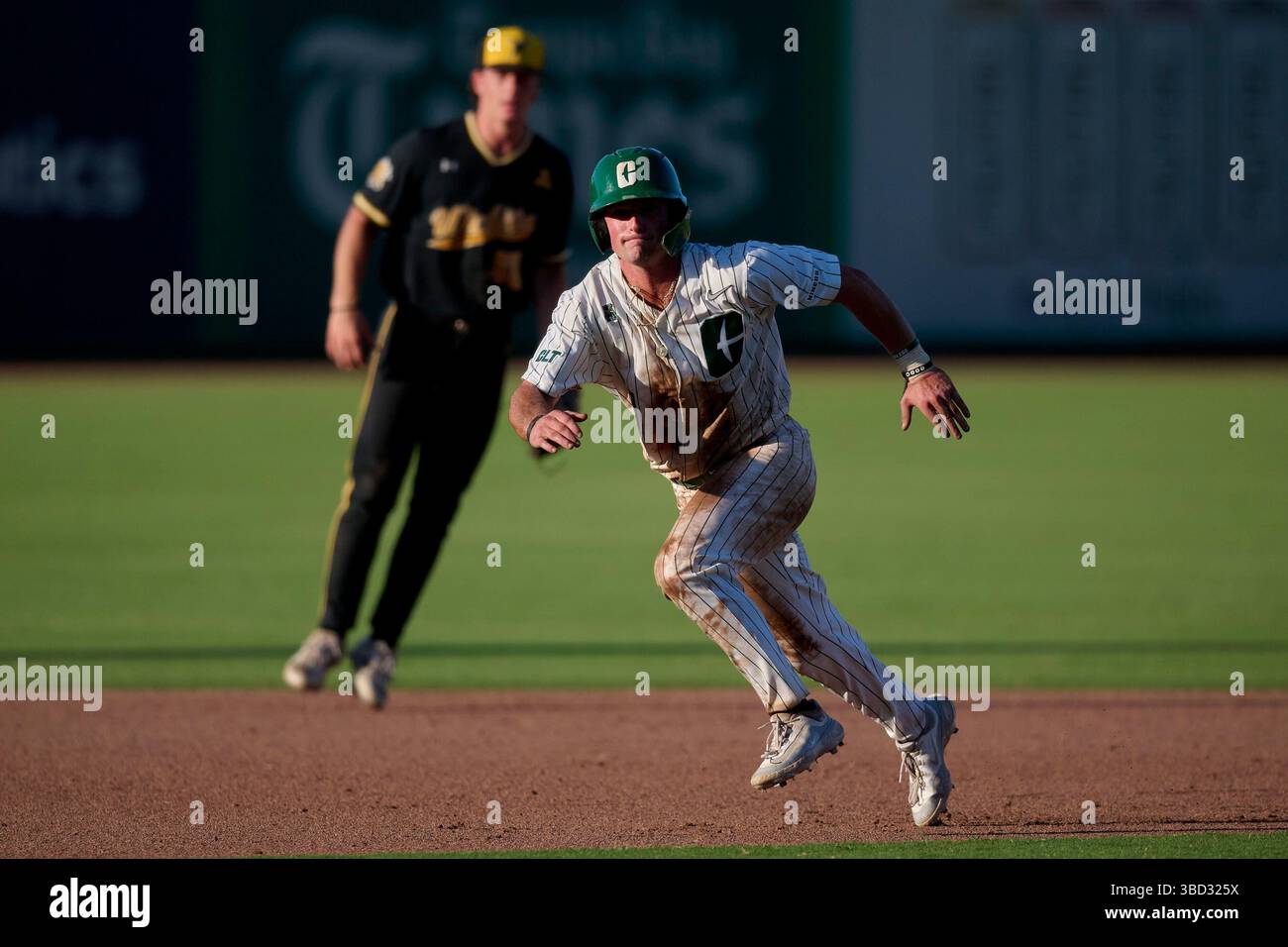 Charlotte 49ers Carson Bayne (1) running the bases during an American ...