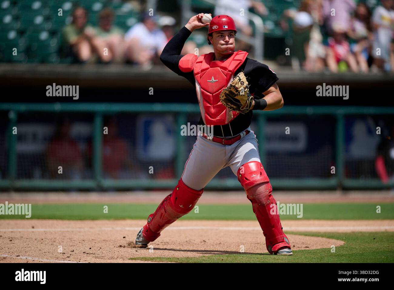 Chattanooga Lookouts catcher Cade Hunter (5) throws to first base ...