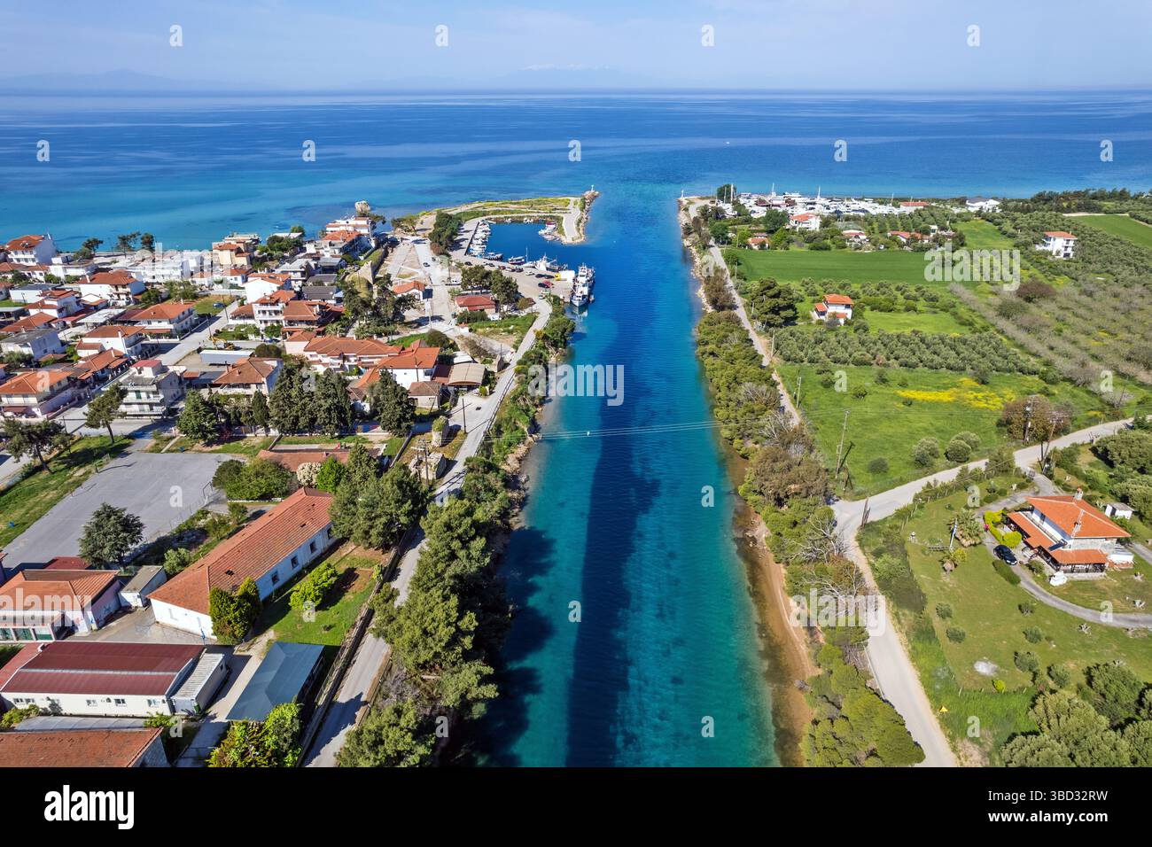 Aerial view of the narrow canal at Nea Potidea in Halkidiki, Greece ...