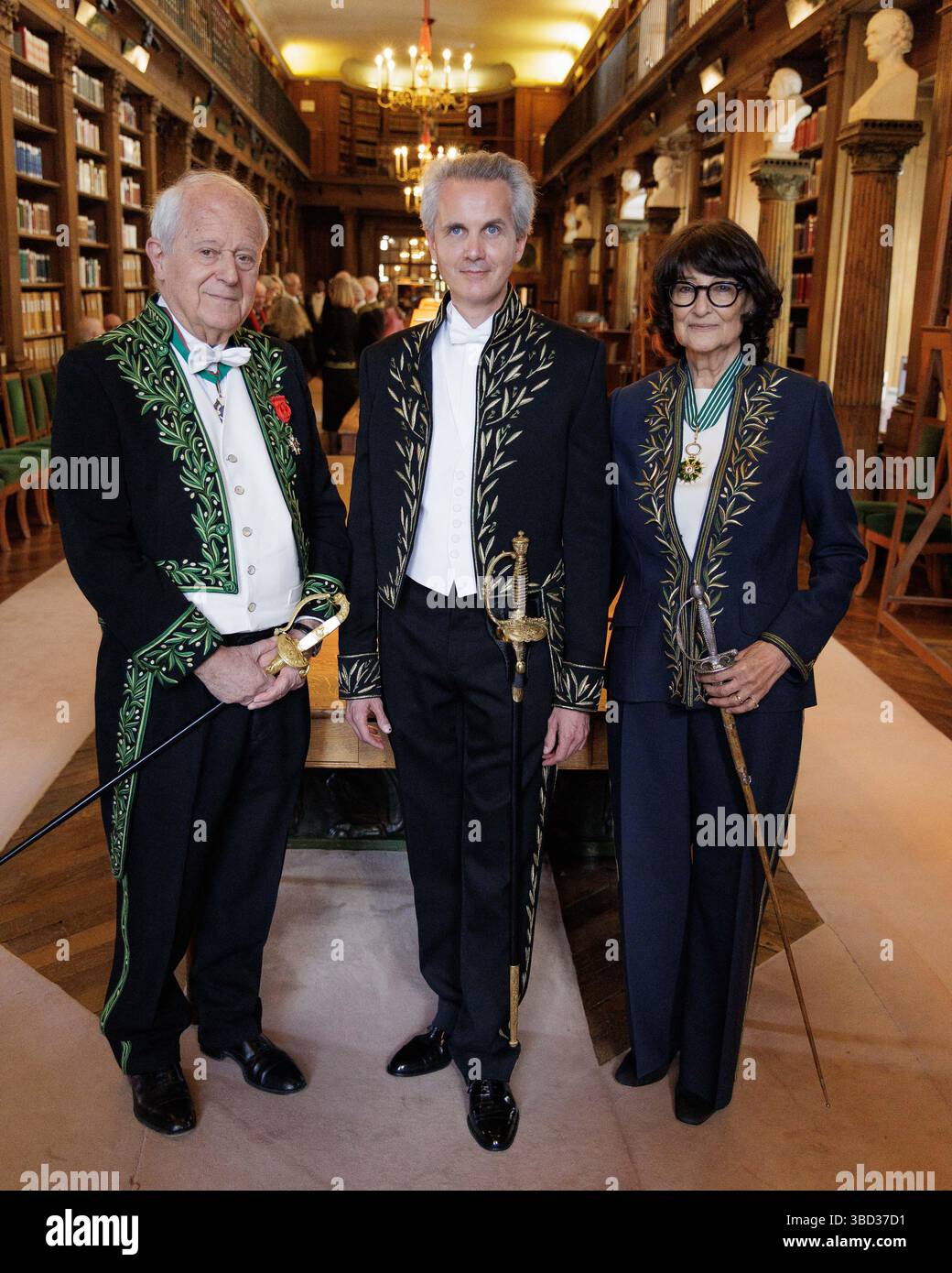 French professor of psychiatry Raphazl Gaillard poses, flanked by ...