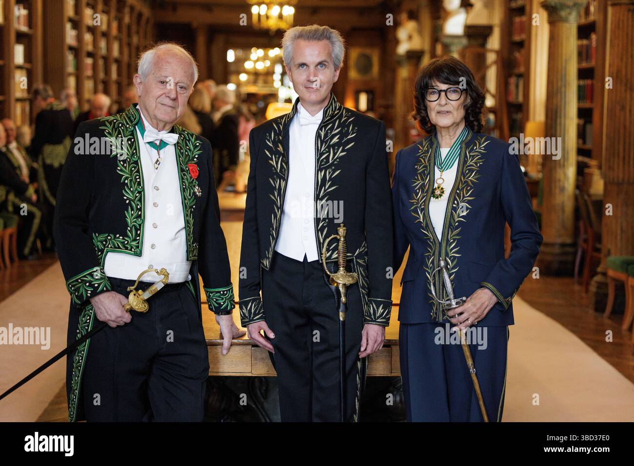 French professor of psychiatry Raphazl Gaillard poses, flanked by ...