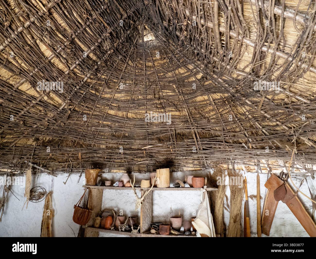 Stone axes and other tools in a reconstructed stone age hut at ...