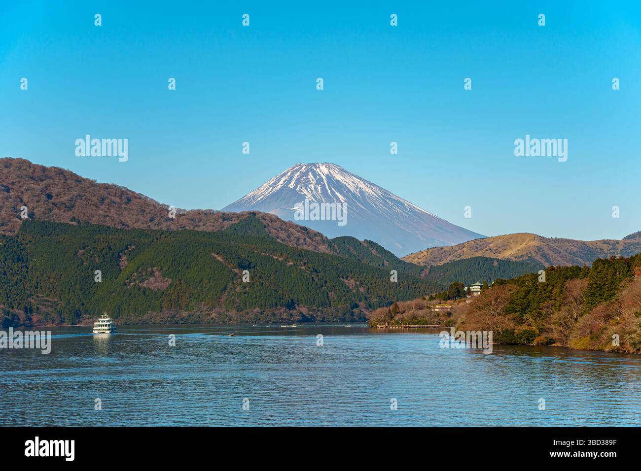 Peaceful morning scene in Hakone, Japan, featuring Lake Ashi, forested ...