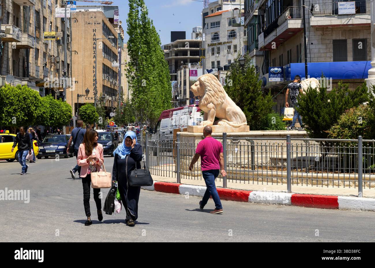 People walk through the Al-Manara Square in Ramallah Stock Photo - Alamy