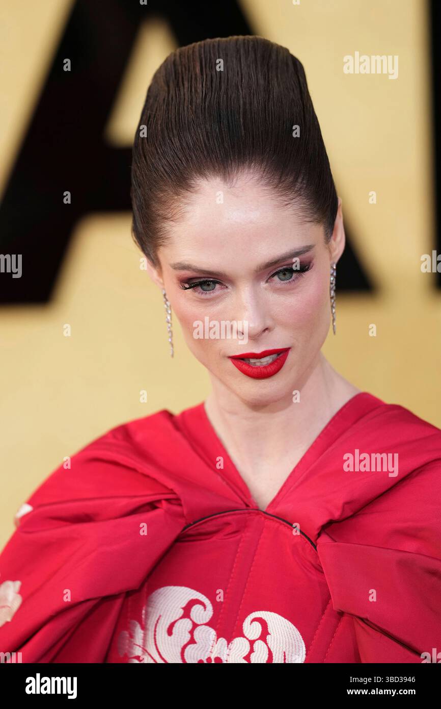 Coco Rocha poses for photographers upon arrival at the amfAR Cinema ...