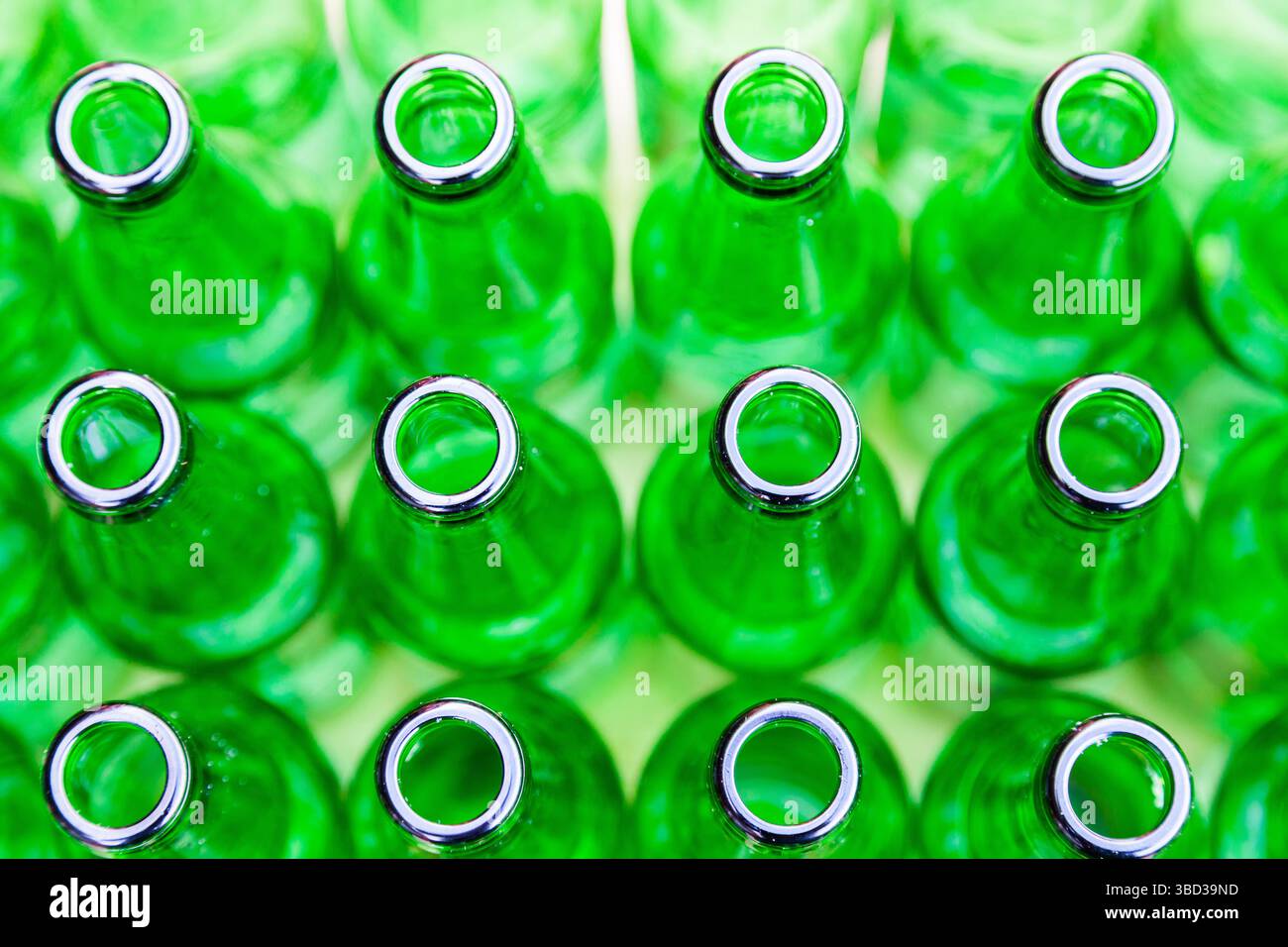 Empty glass beer bottles, top view Stock Photo - Alamy