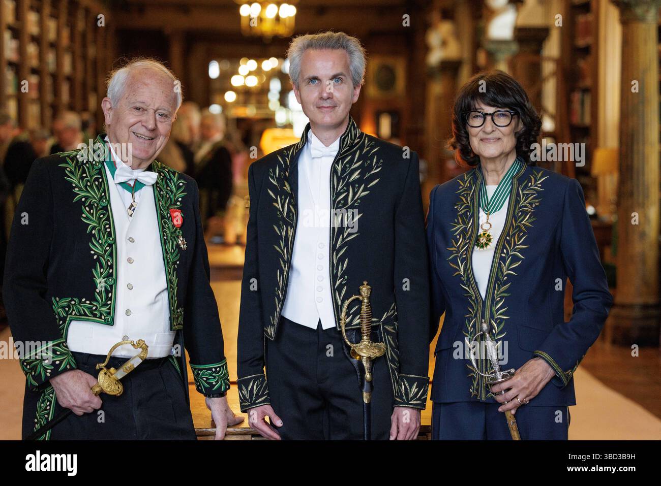 French professor of psychiatry Raphael Gaillard poses, flanked by ...