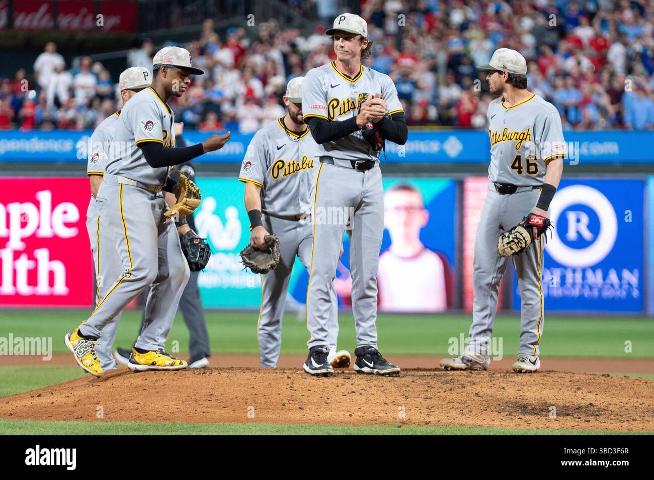 Pittsburgh Pirates relief pitcher Ryan Borucki, center, looks on as his ...