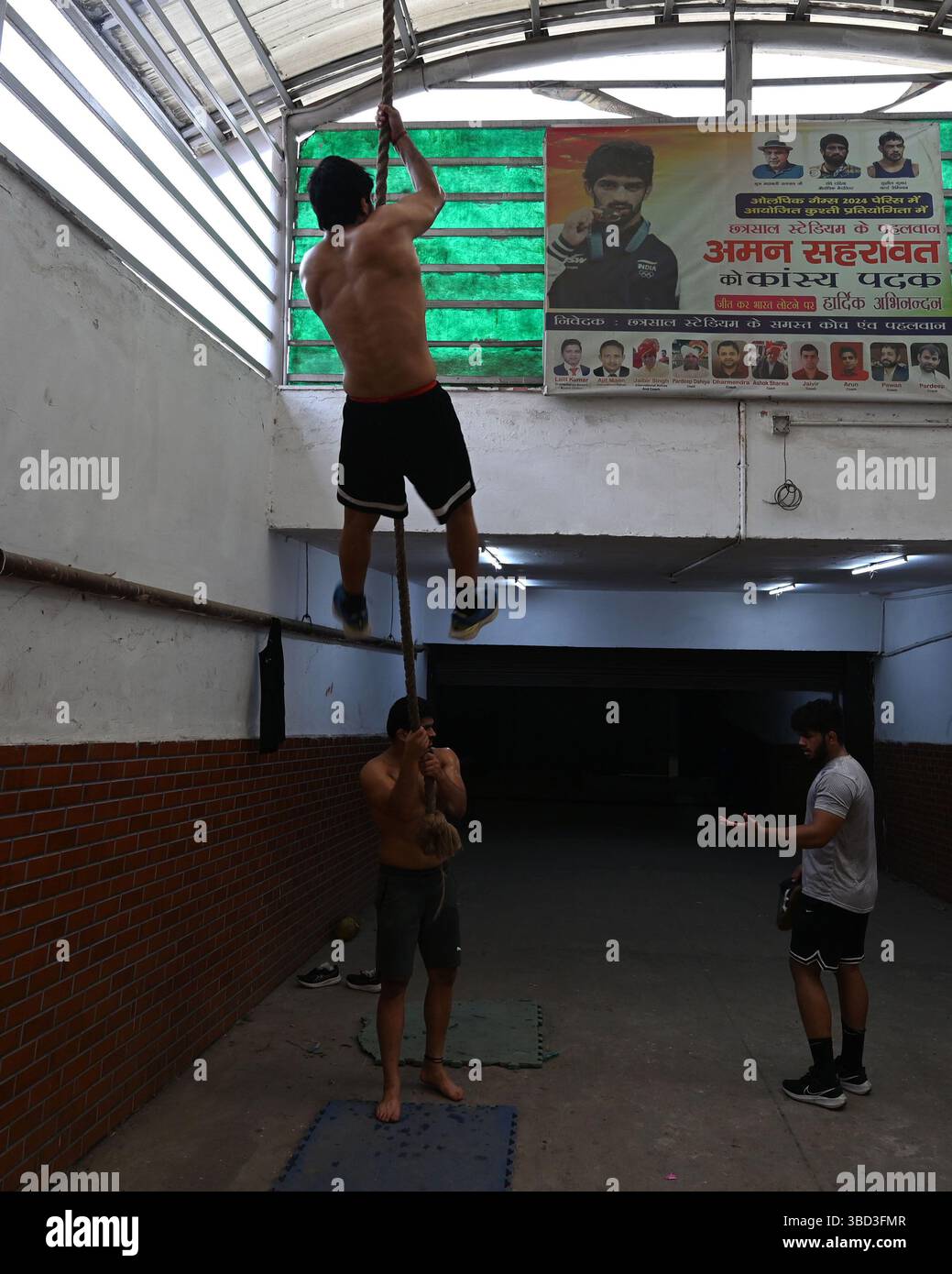 NEW DELHI, INDIA - MAY 22: Wrestlers practicing at Chhatrasal Stadium ...