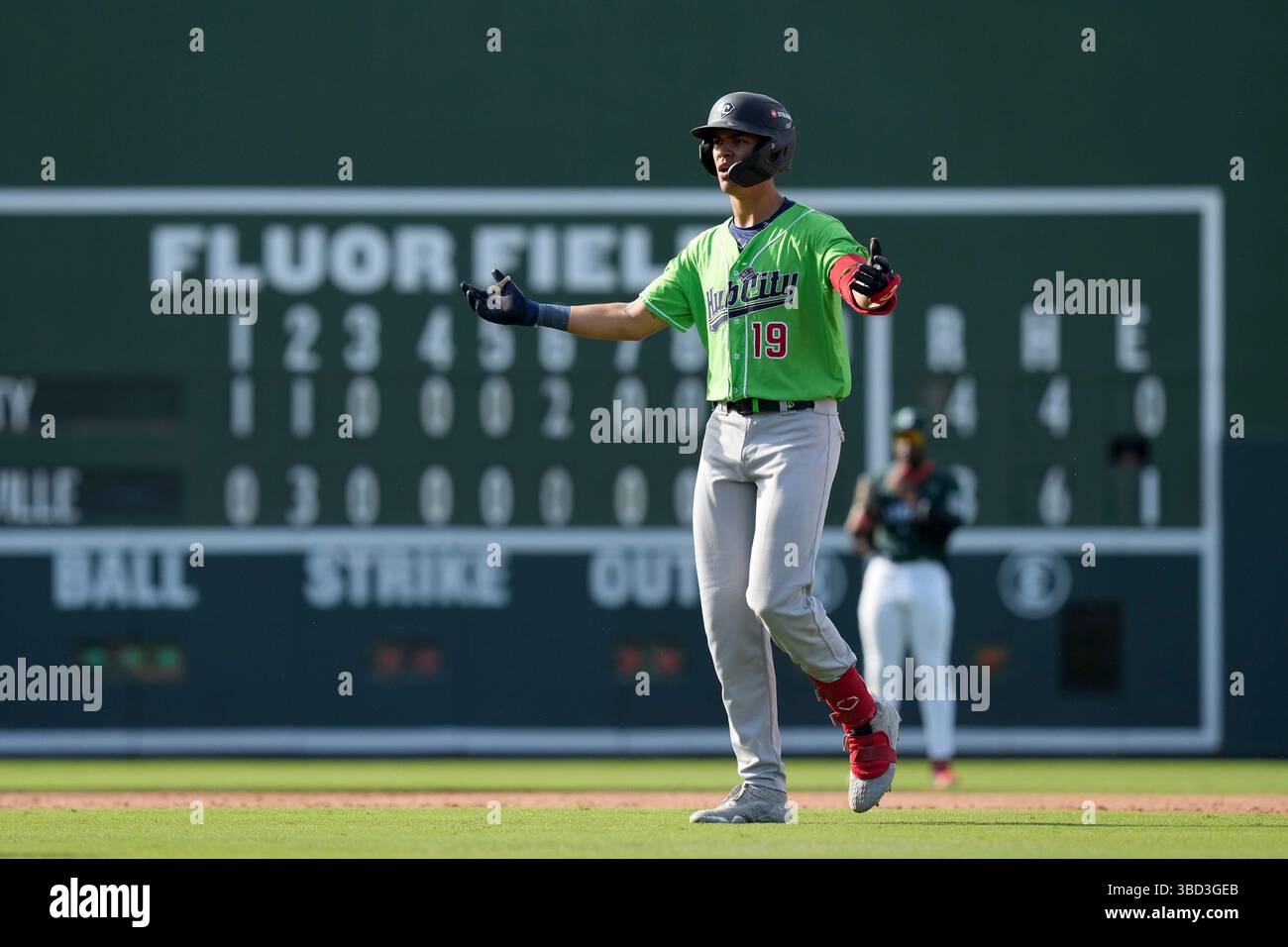 Quincy Scott (19) of the Hub City Spartanburgers questions a call at ...
