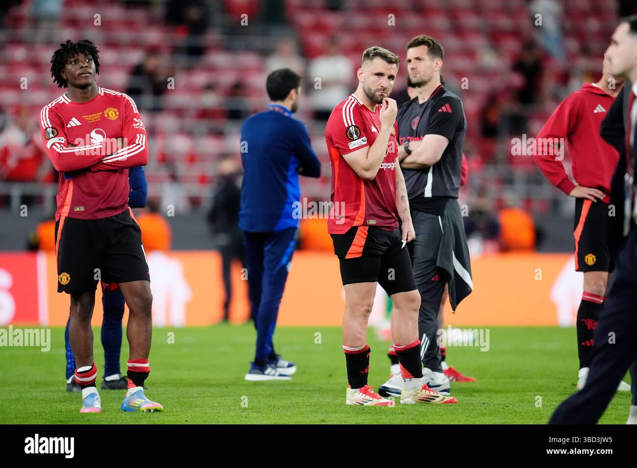 Manchester United's Luke Shaw (centre right) reacts after the UEFA ...
