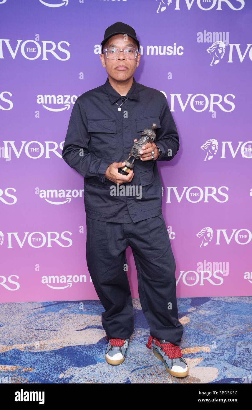 Vince Pope, winner of the Best TV Soundtrack award, poses in the ...