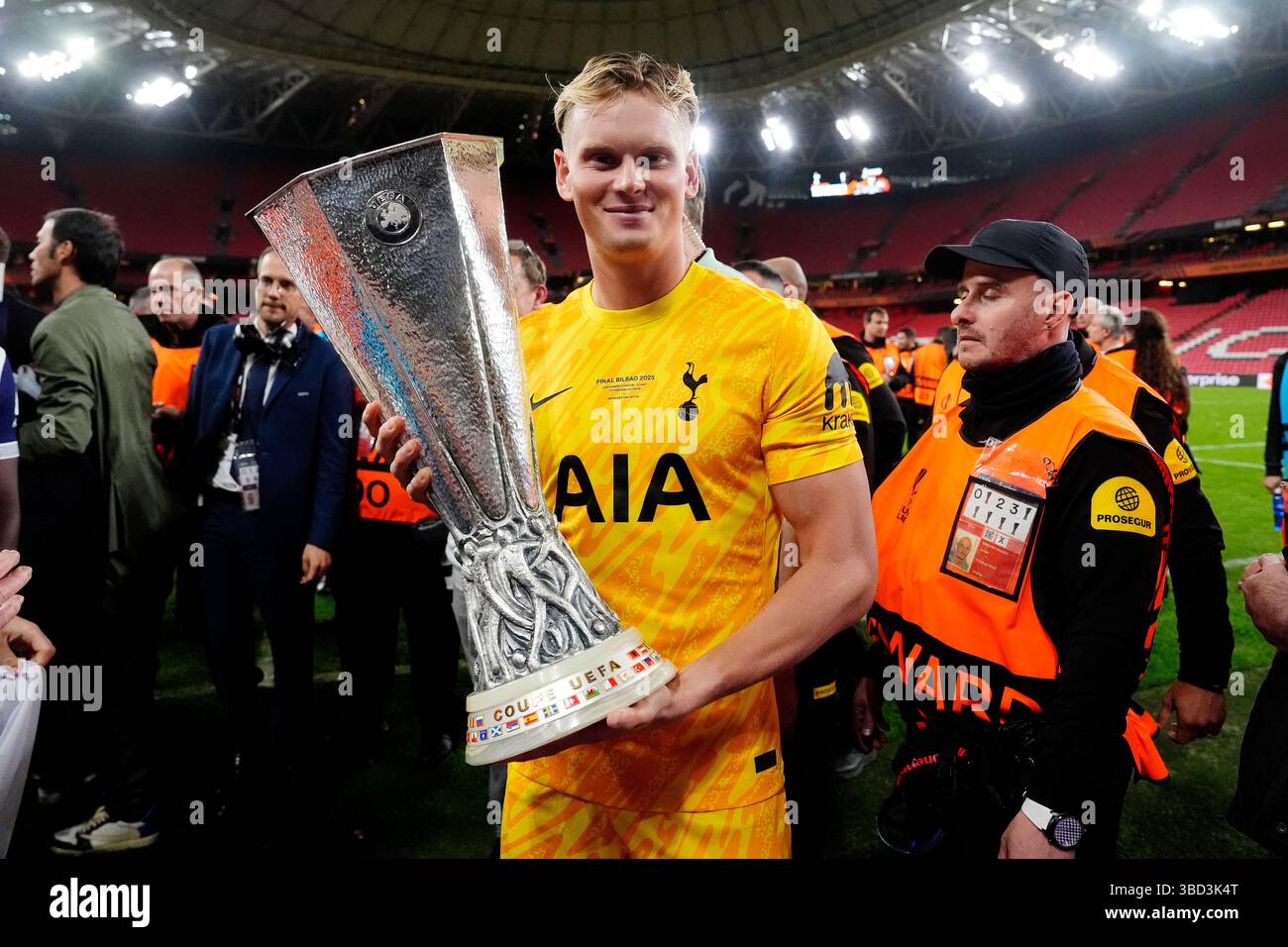 Tottenham Hotspur goalkeeper Antonin Kinsky celebrates with the trophy ...
