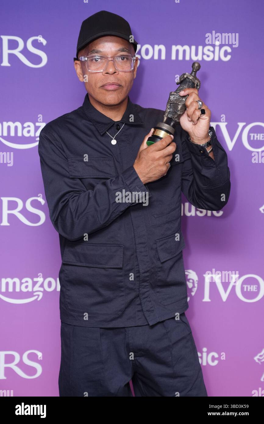 Vince Pope, winner of the Best TV Soundtrack award, poses in the ...