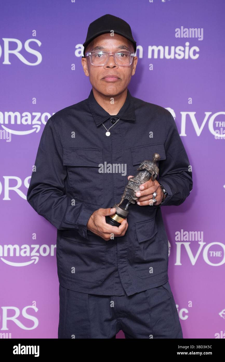 Vince Pope, winner of the Best TV Soundtrack award, poses in the ...