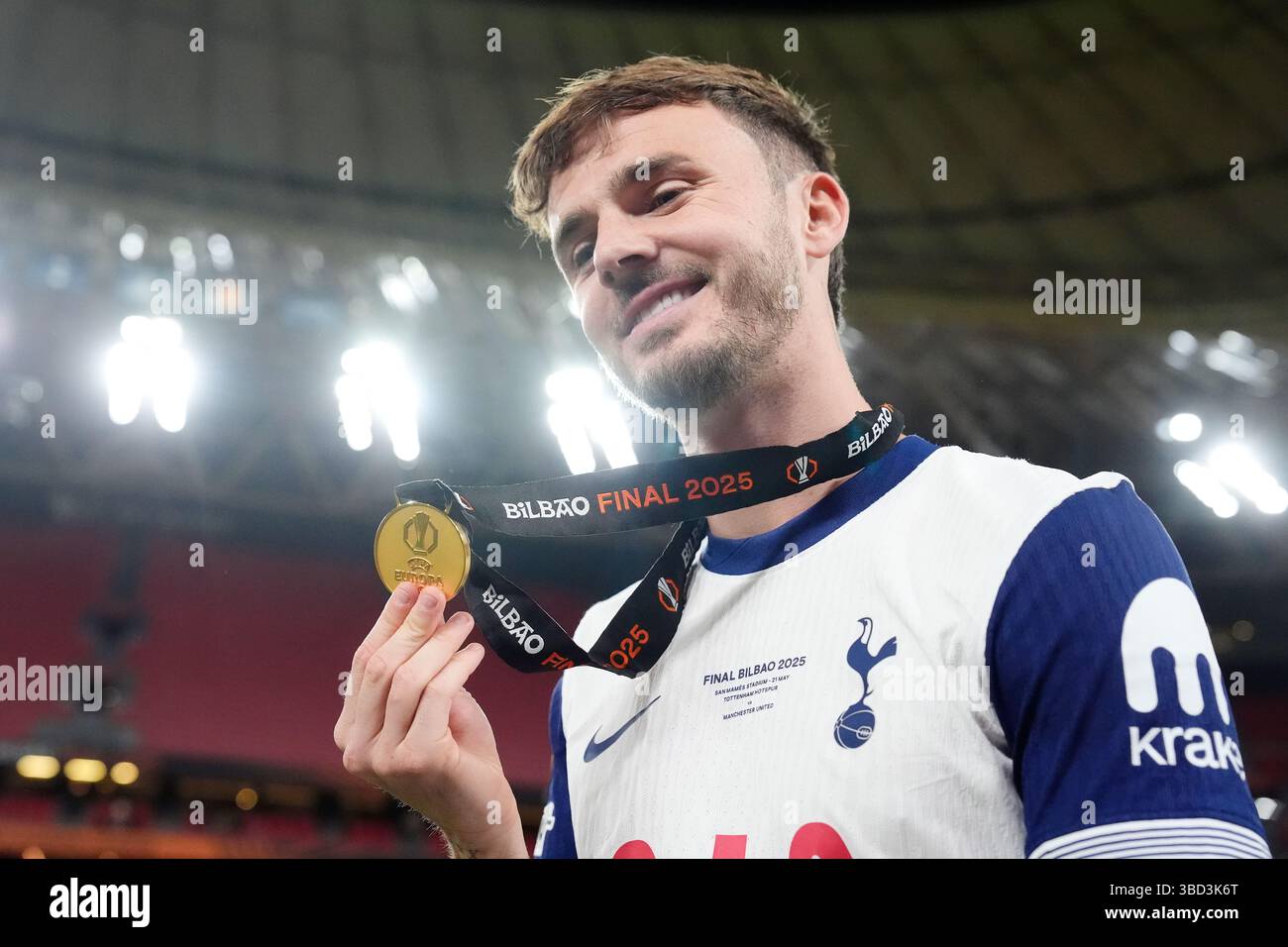 Tottenham Hotspur's James Maddison celebrates with his medal after ...