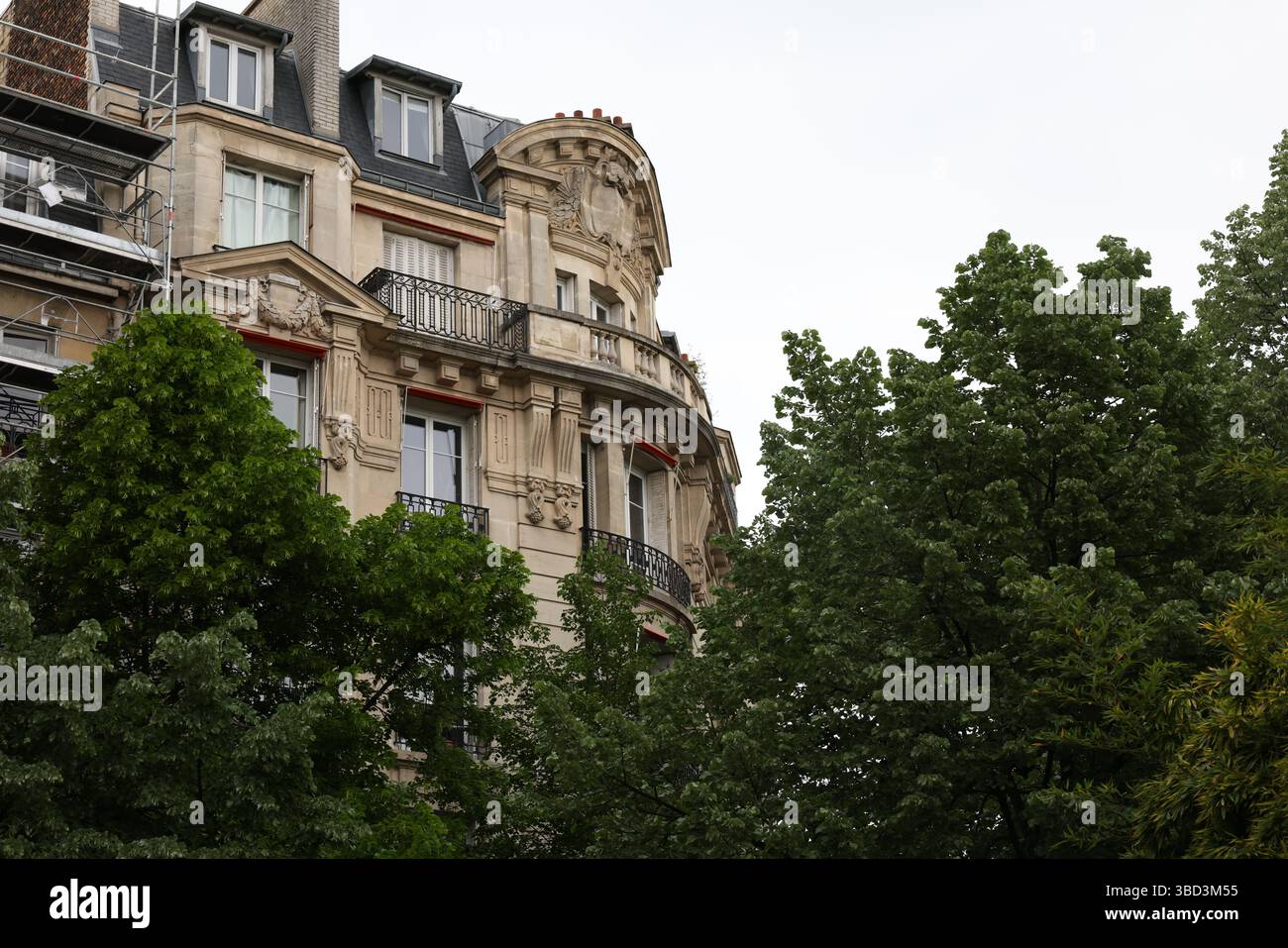 A stunning historic European building features an ornately sculpted ...