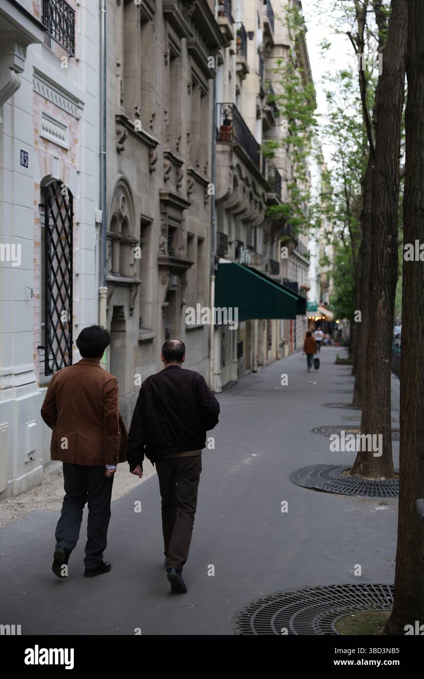 An elegant European street lined with historic buildings featuring ...