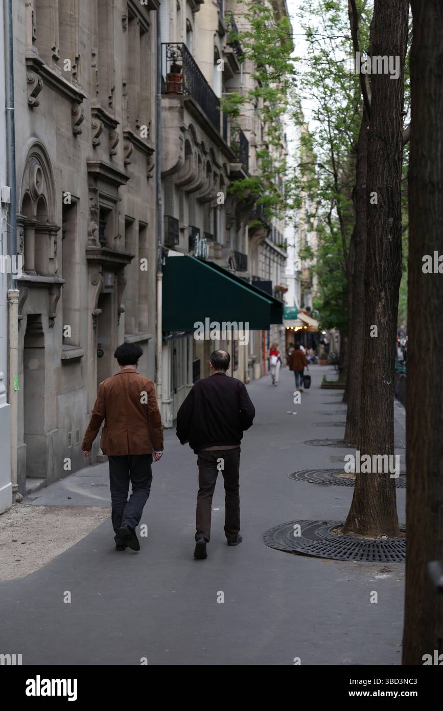 An elegant European street lined with historic buildings featuring ...