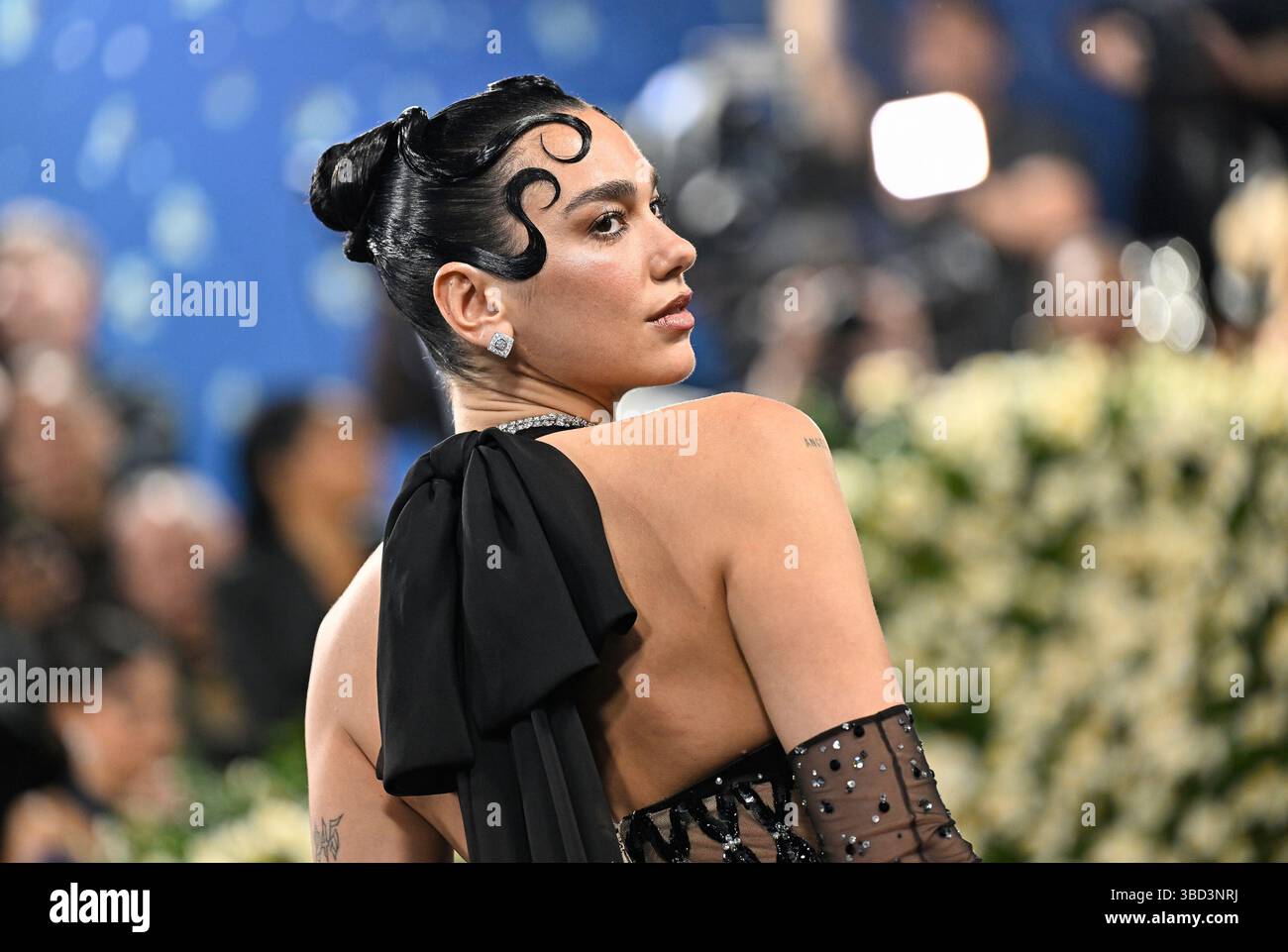 Dua Lipa attends The Metropolitan Museum of Art's Costume Institute ...