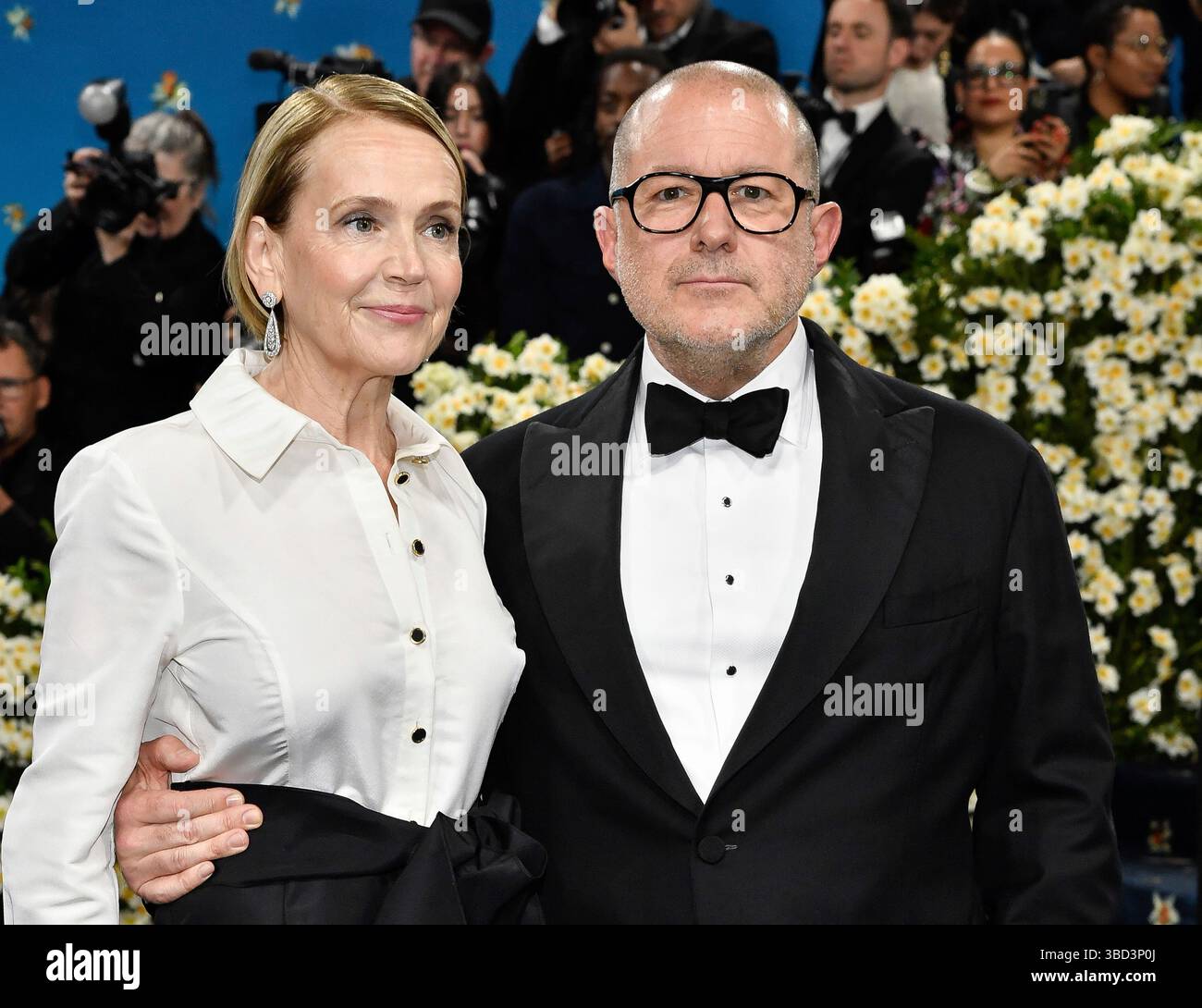 Jony Ive, right, and wife Heather Pegg Ive attend The Metropolitan ...