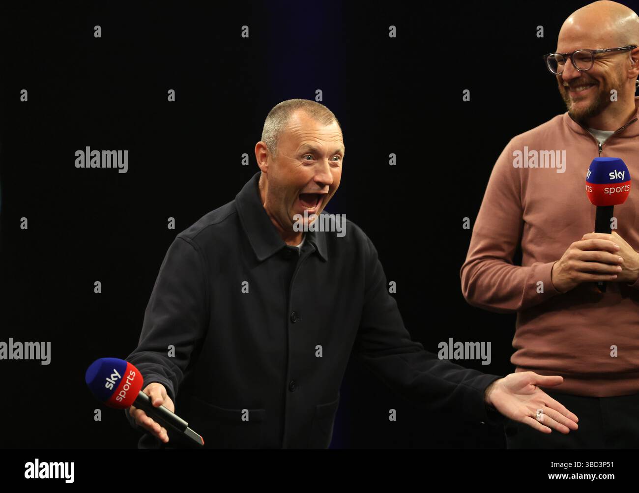 Former darts player Wayne Mardle (left) and Sky Sports presenter Mark ...