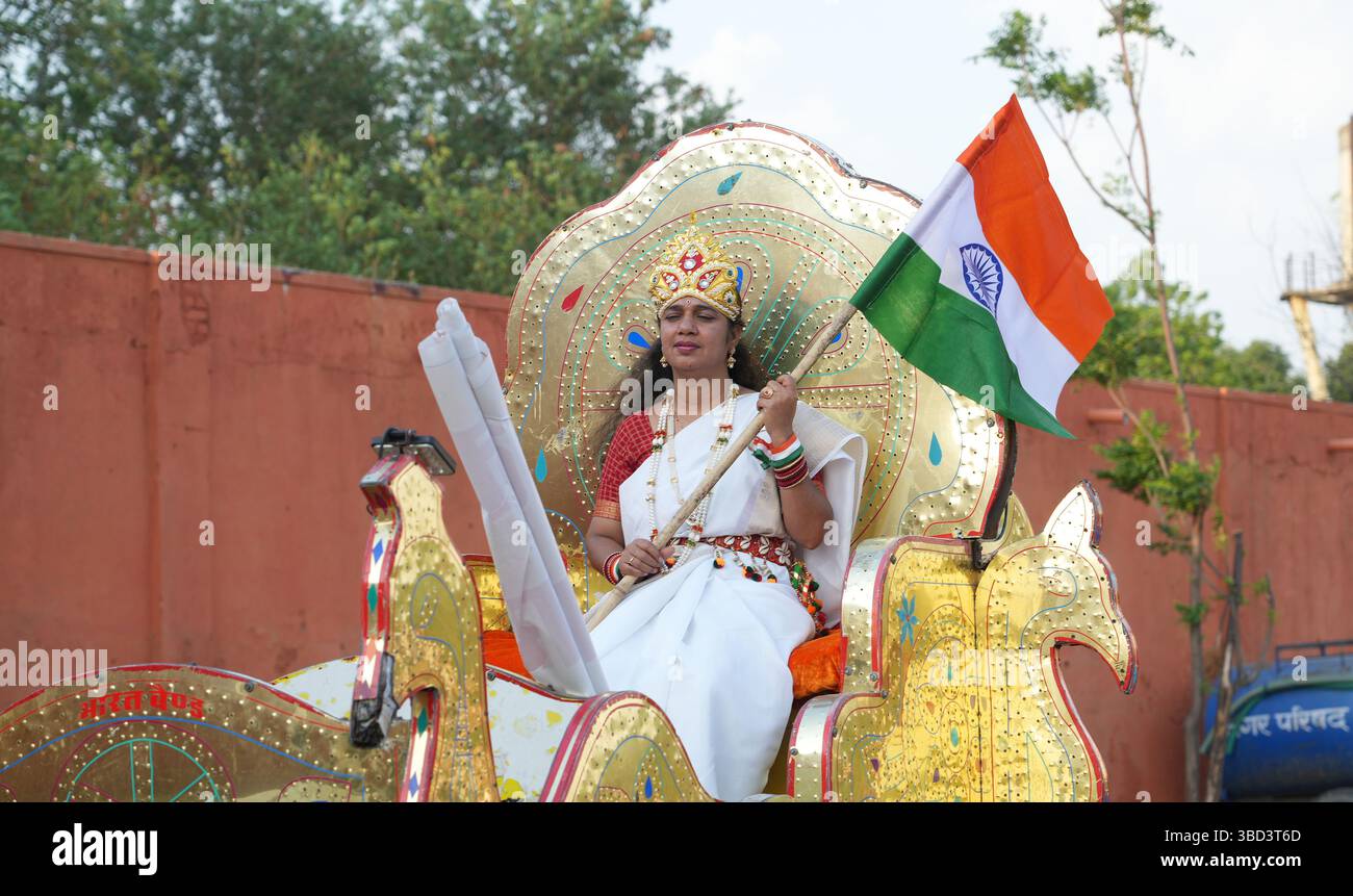 Bhilwara, India, May 20, 2025: A woman dressed as Bharat Mata, a ...