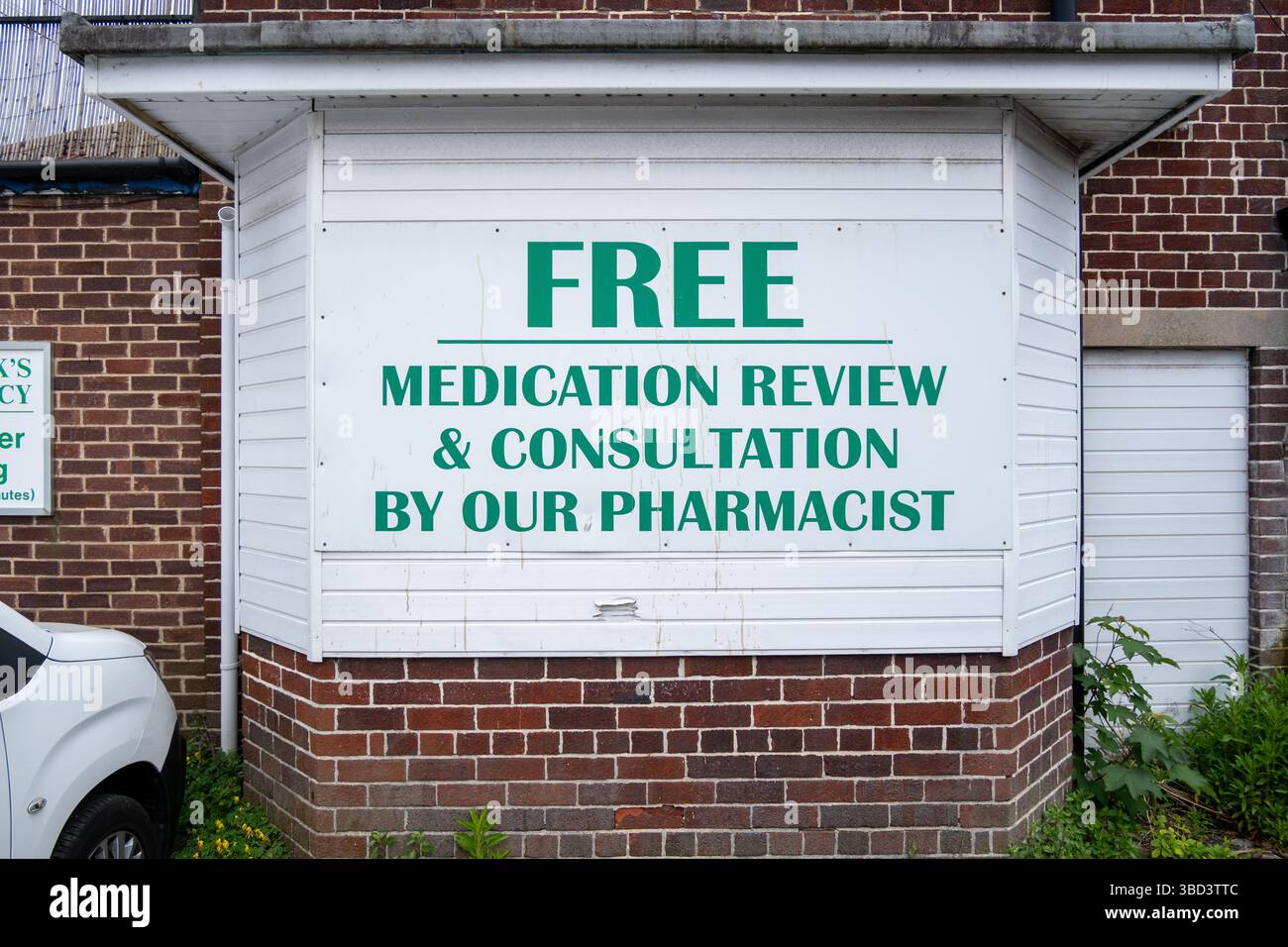 Free medication review and consultation sign Stock Photo - Alamy