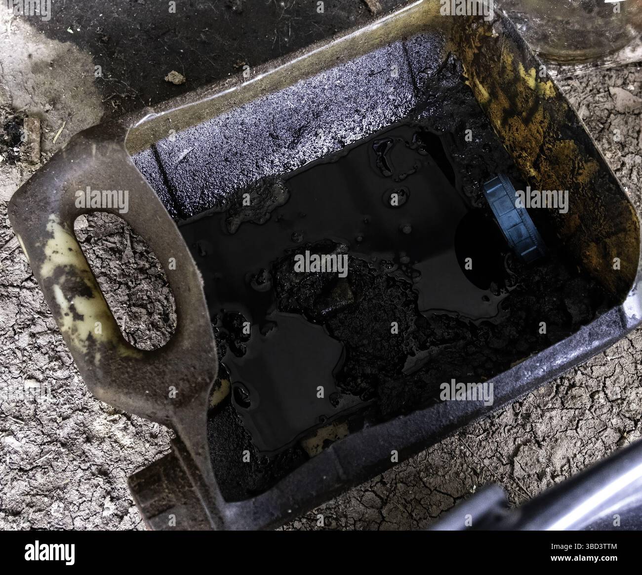 Detail of dirty and used oil, pollution and destruction of the ...