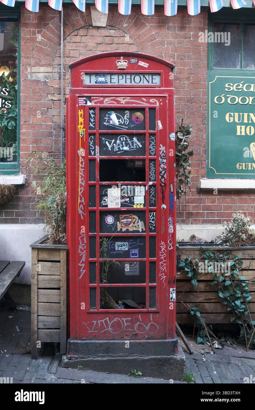 Graffiti covered red telephone box, Bristol, UK Stock Photo - Alamy