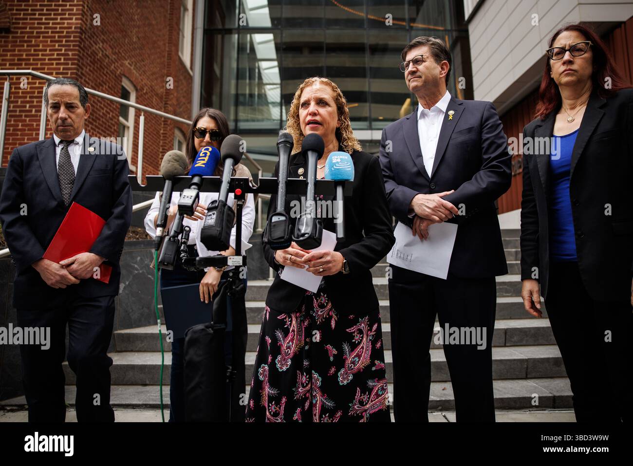 Rep. Debbie Wasserman Schultz (D-FL) speaks alongside (left to right ...