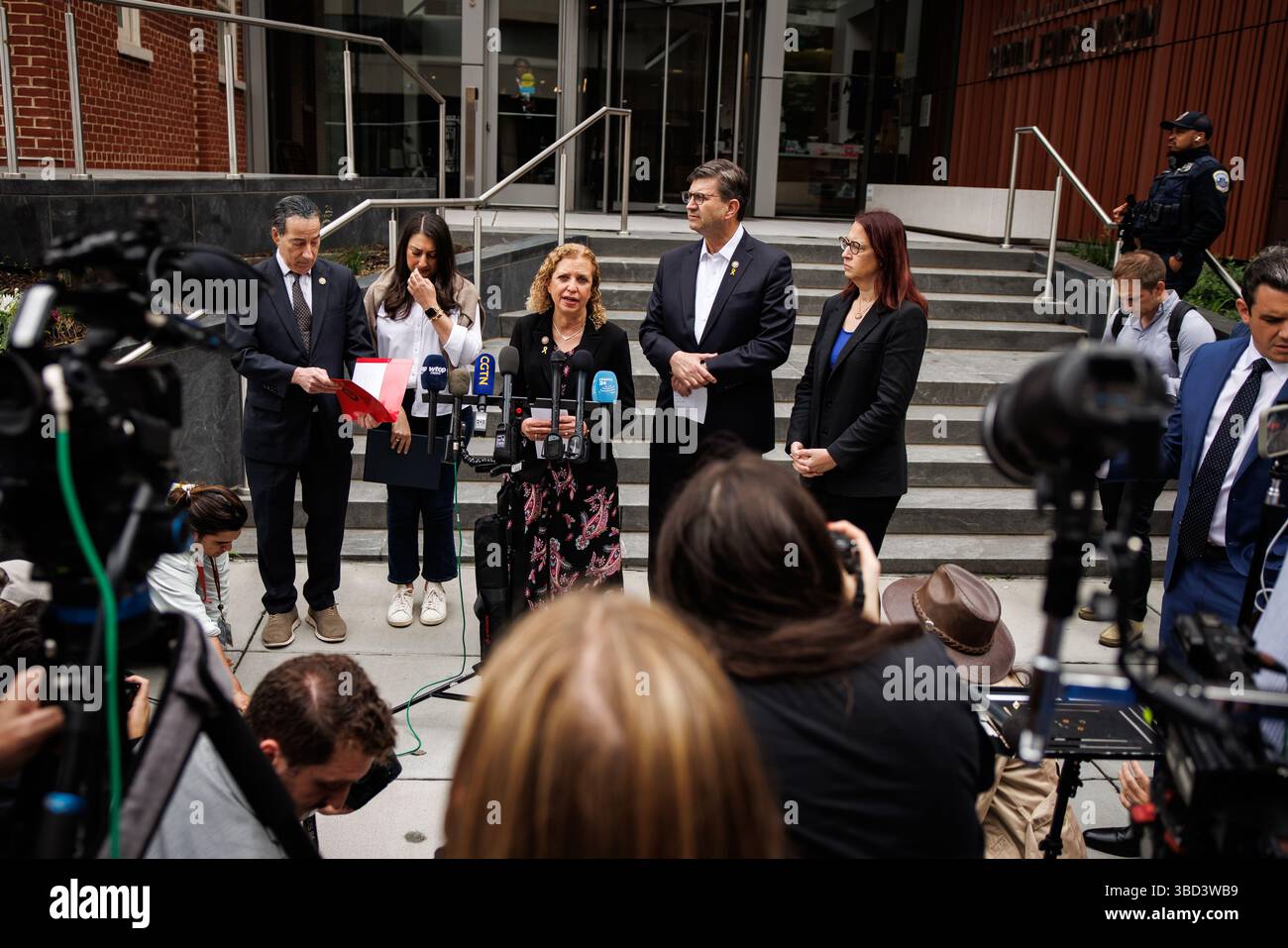 Rep. Debbie Wasserman Schultz (D-FL) speaks alongside (left to right ...