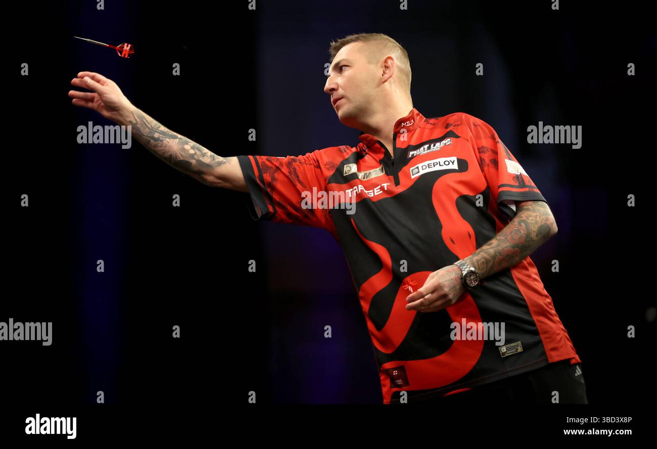 Nathan Aspinall in action against Michael van Gerwen in their quarter ...