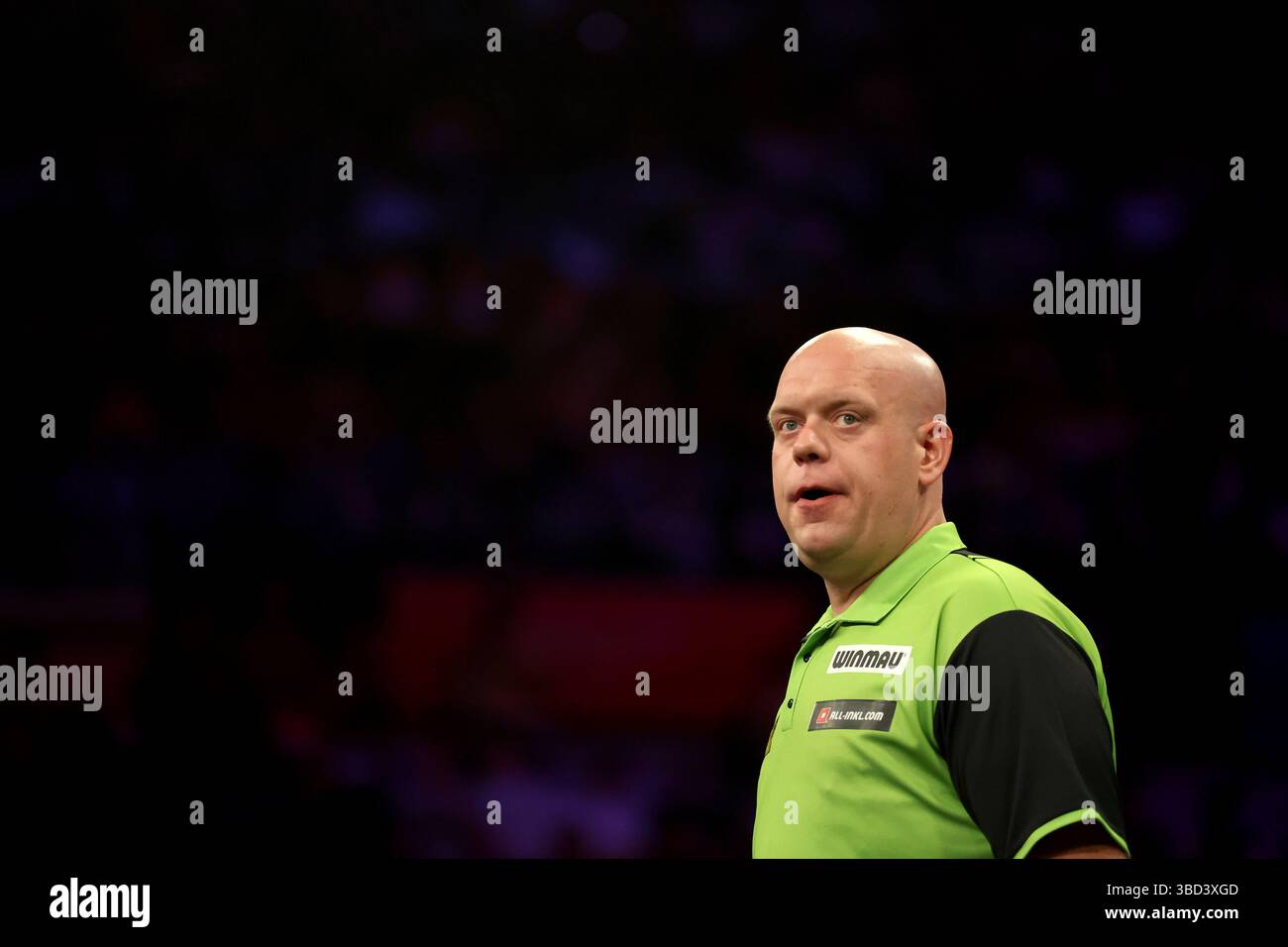 Michael van Gerwen reacts against Nathan Aspinall in their quarter ...