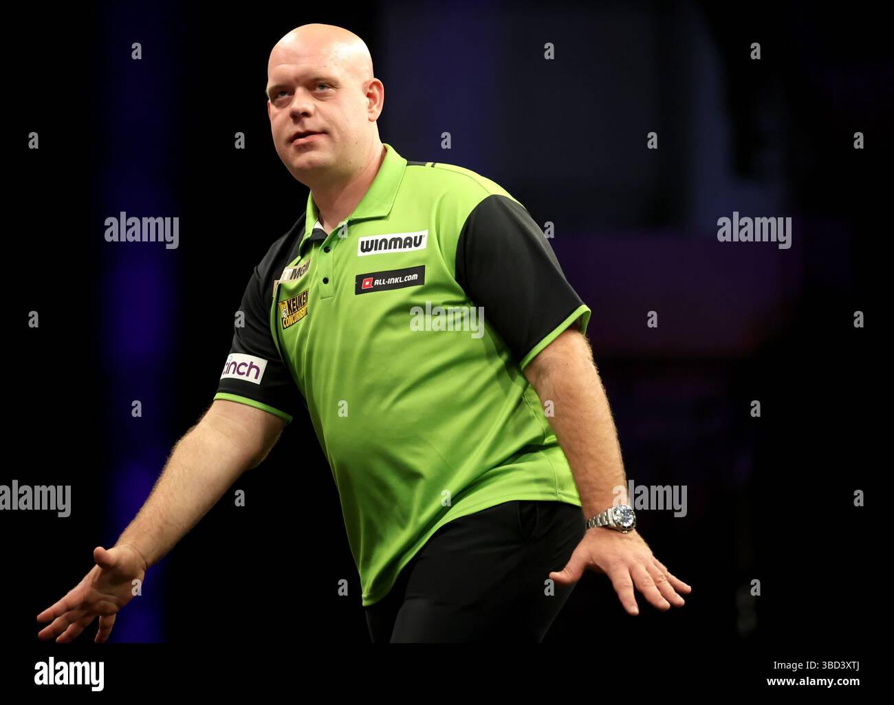 Michael van Gerwen reacts against Nathan Aspinall in their quarter ...