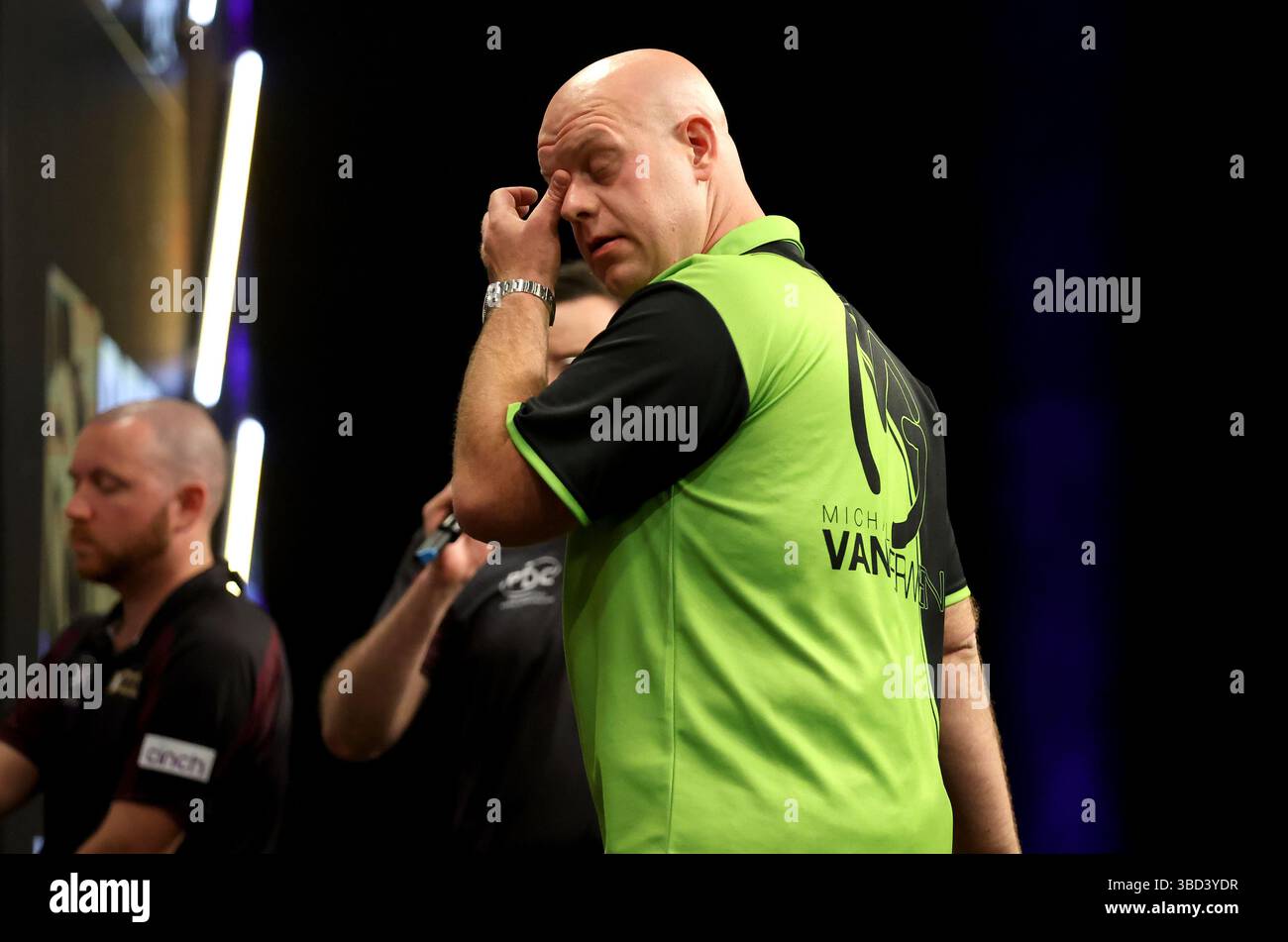 Michael van Gerwen reacts against Nathan Aspinall in their quarter ...