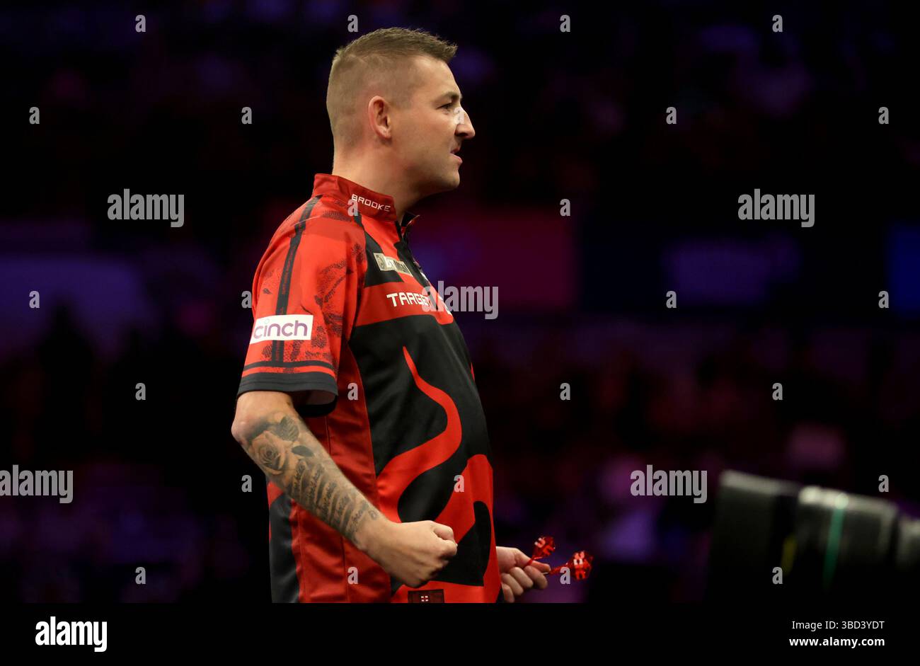 Nathan Aspinall reacts against Michael van Gerwen in their quarter ...