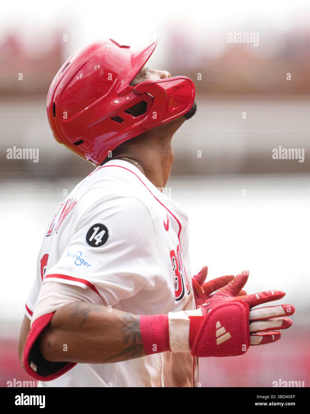 Cincinnati Reds' Will Benson gestures as he rounds the bases after ...