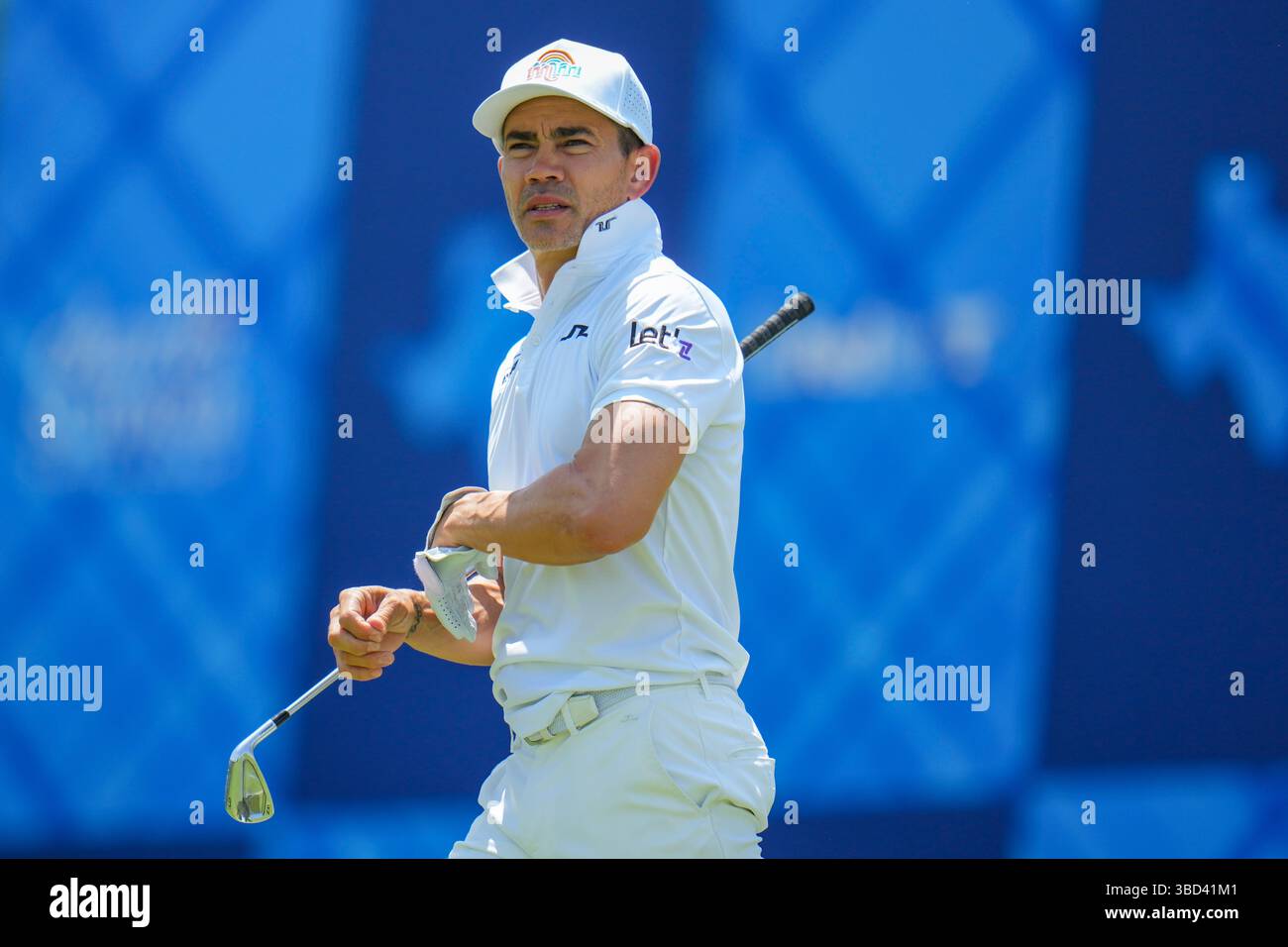Camilo Villegas watches his tee shot on the 16th hole during the first ...