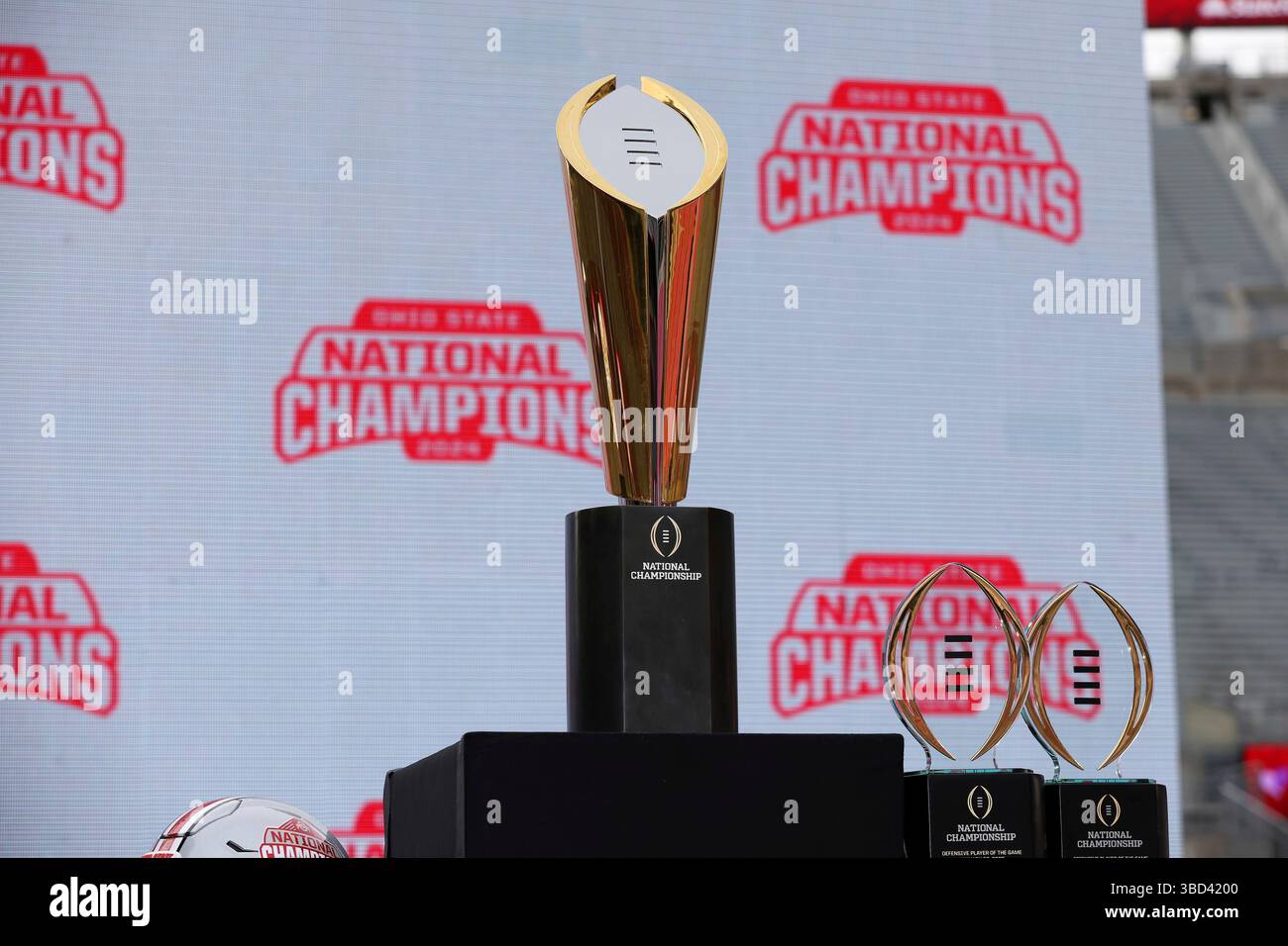 FILE - The College Football Playoff National Championship Trophy on ...