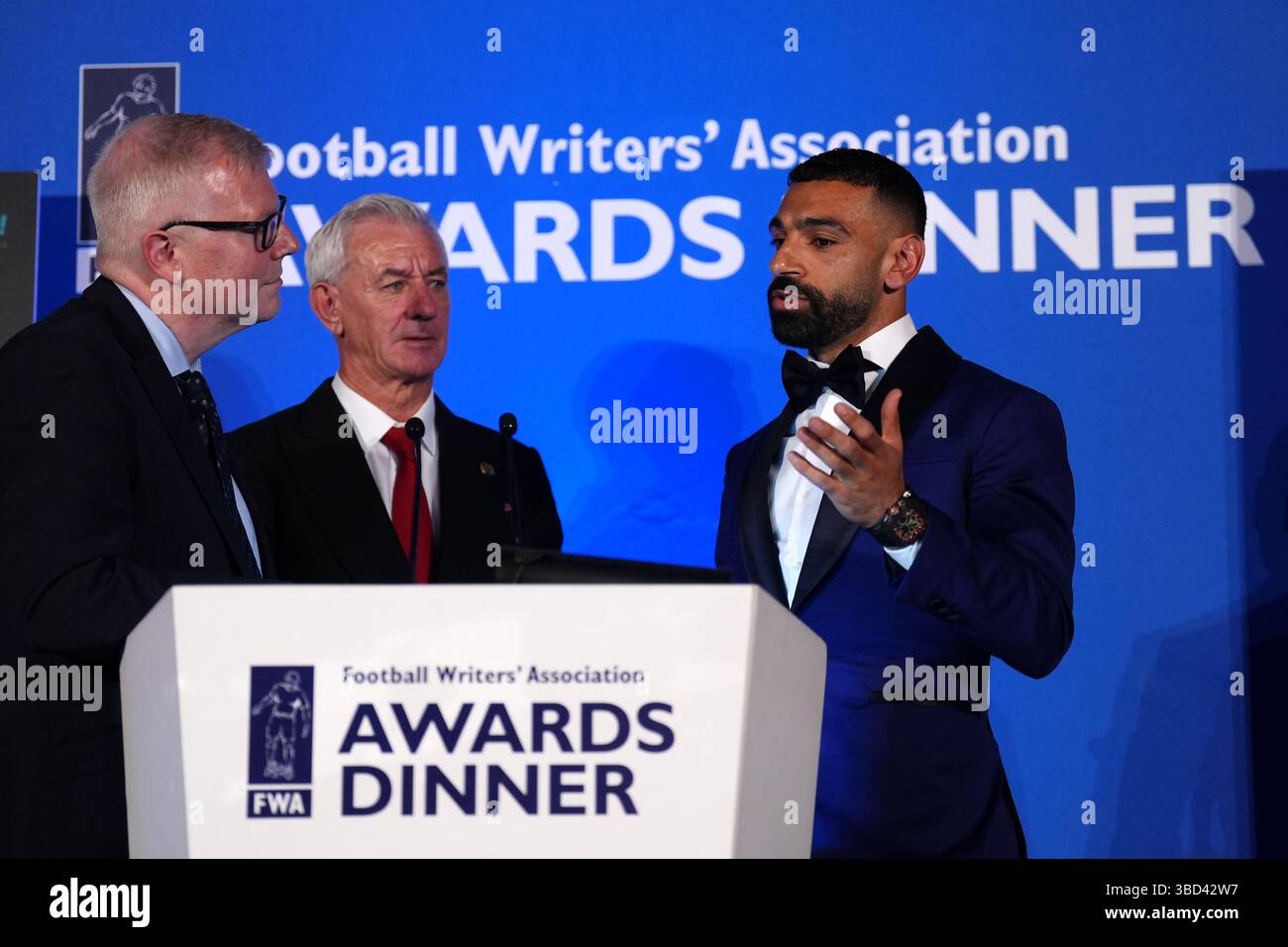 FWA chair John Cross, Ian Rush, and FWA Footballer of the Year Mohamed ...