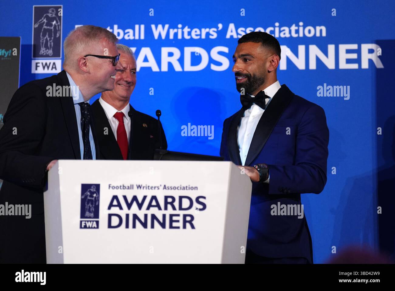 FWA chair John Cross, Ian Rush, and FWA Footballer of the Year Mohamed ...