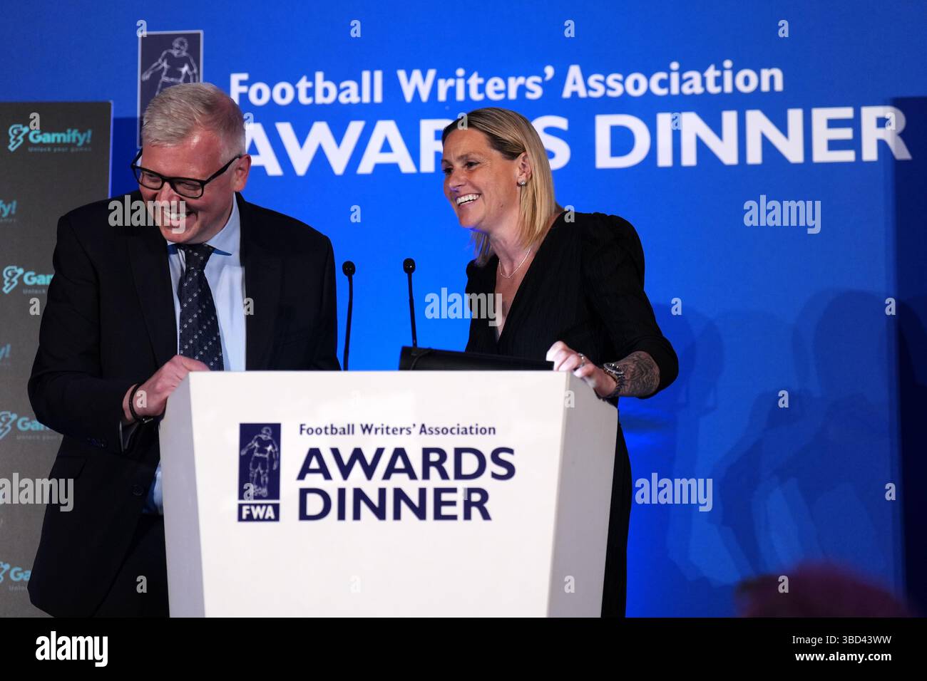 FWA chair John Cross (left) and Kelly Smith during the FWA Footballer ...