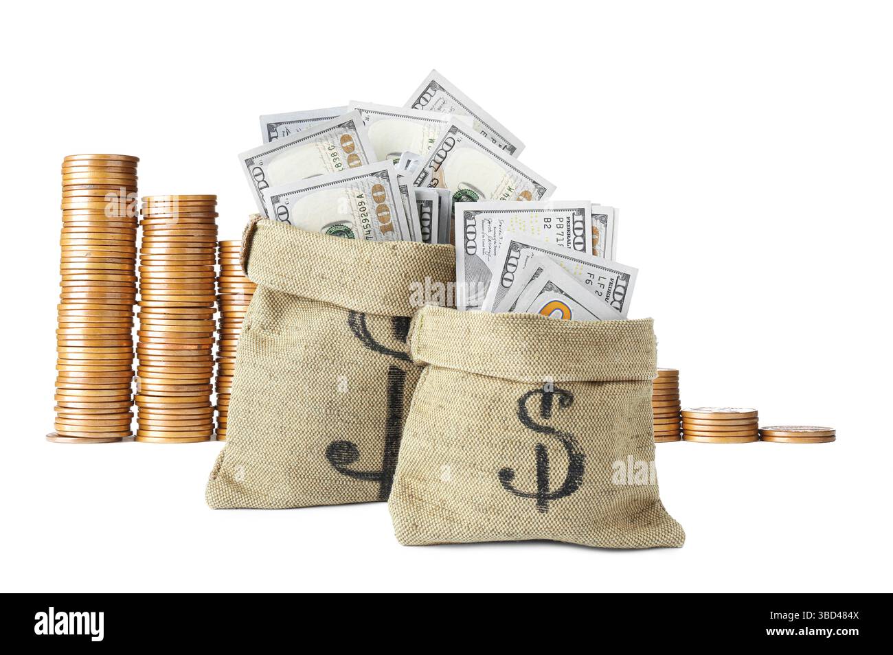 Wealth. Burlap bags full of dollar bills and stacked coins isolated on ...
