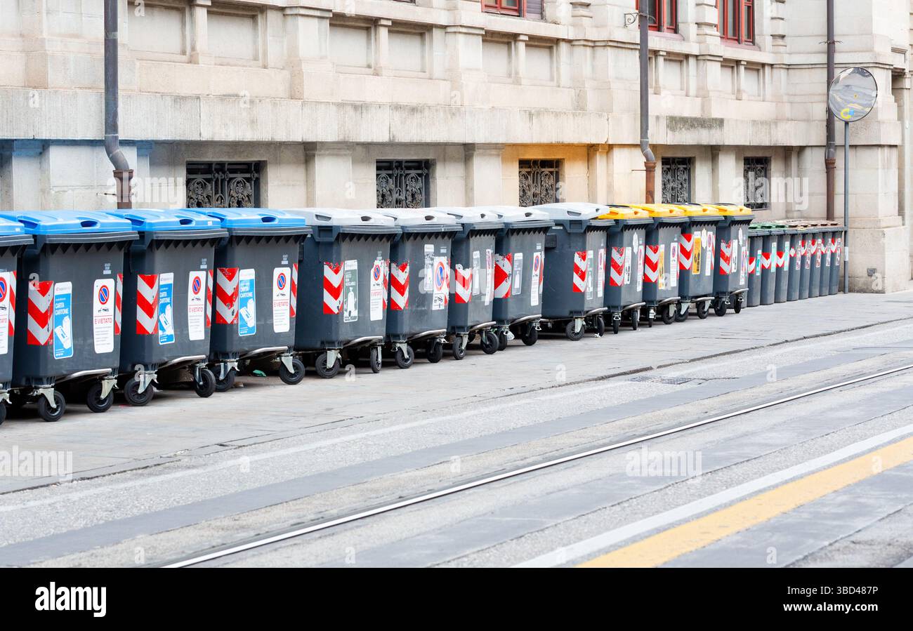 Padua, Italy - April 14, 2025: A lot of big gray garbage cans are ...