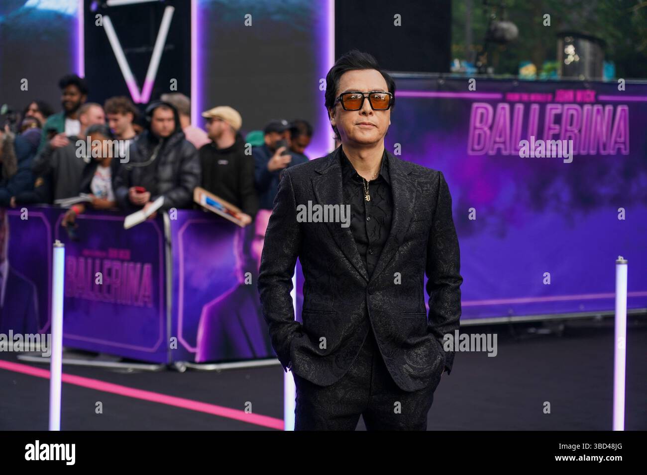 Donnie Yen poses for photographers upon arrival at the World premiere ...