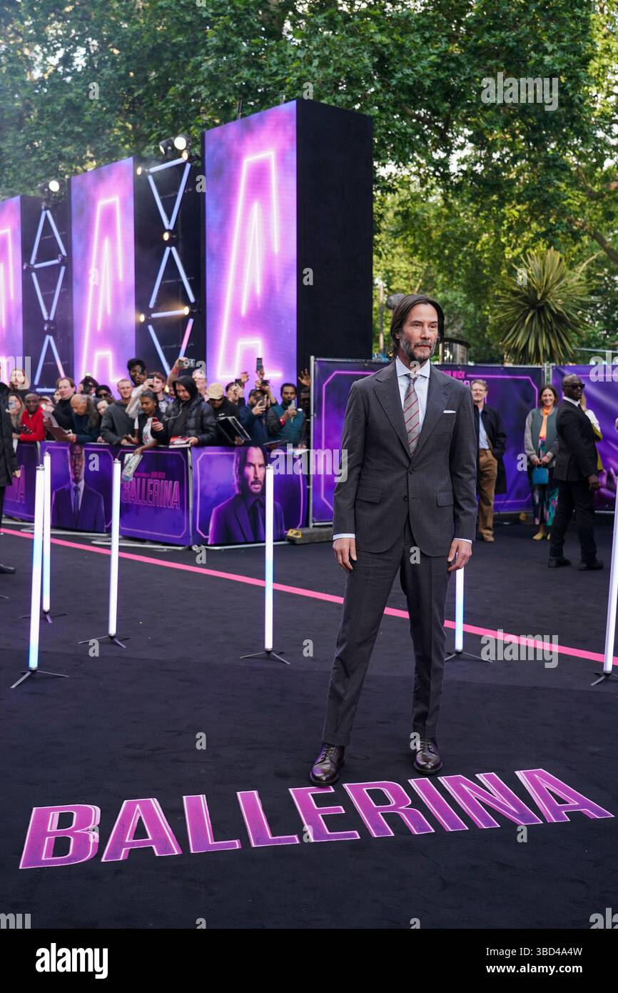 Keanu Reeves poses for photographers upon arrival at the World premiere ...