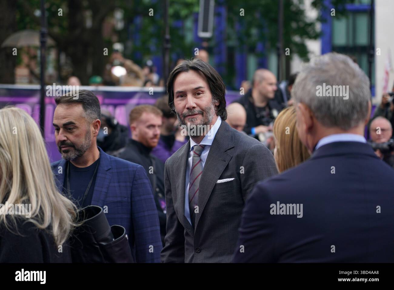 Keanu Reeves poses for photographers upon arrival at the World premiere of the film 'Ballerina ...