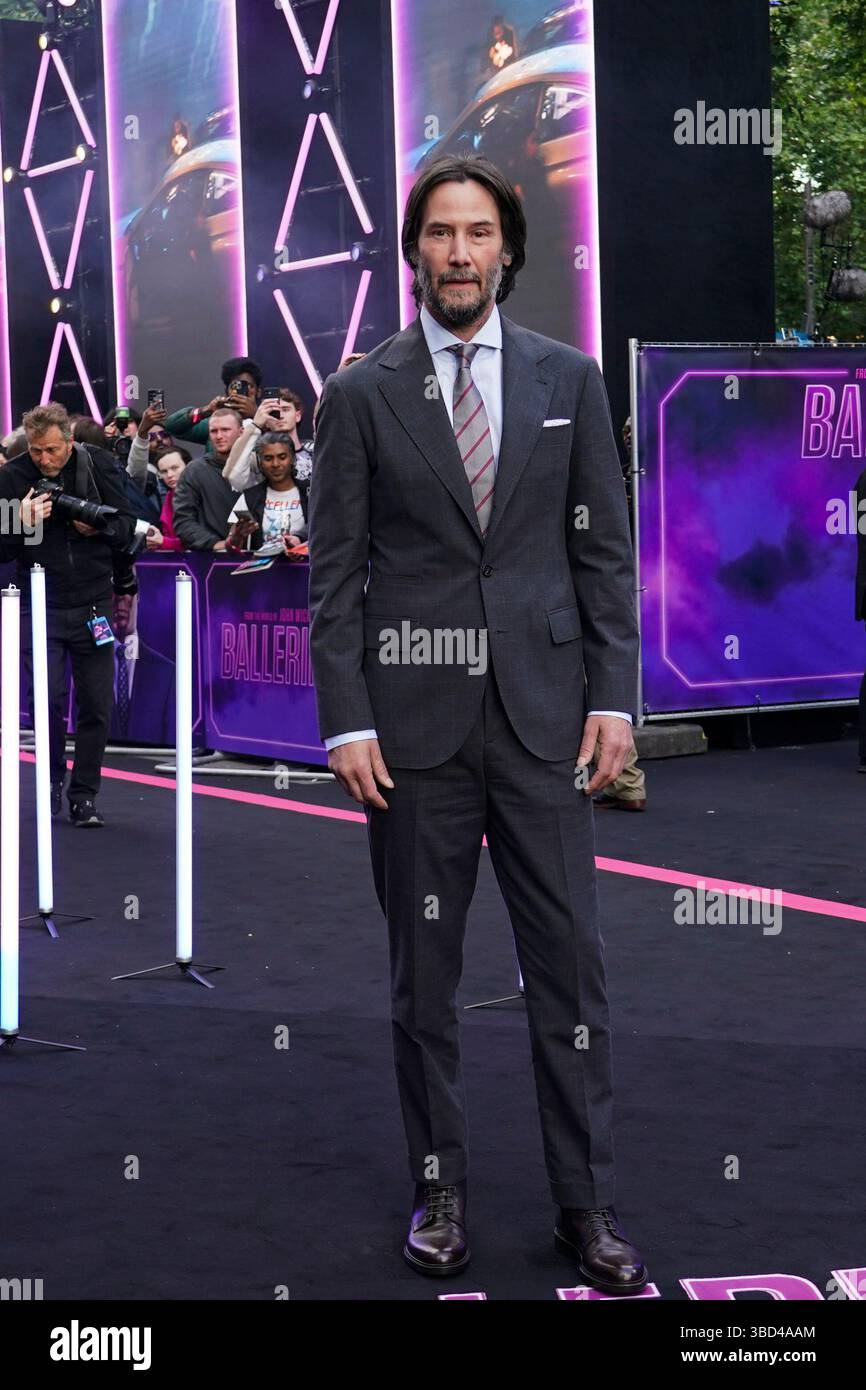 Keanu Reeves poses for photographers upon arrival at the World premiere ...